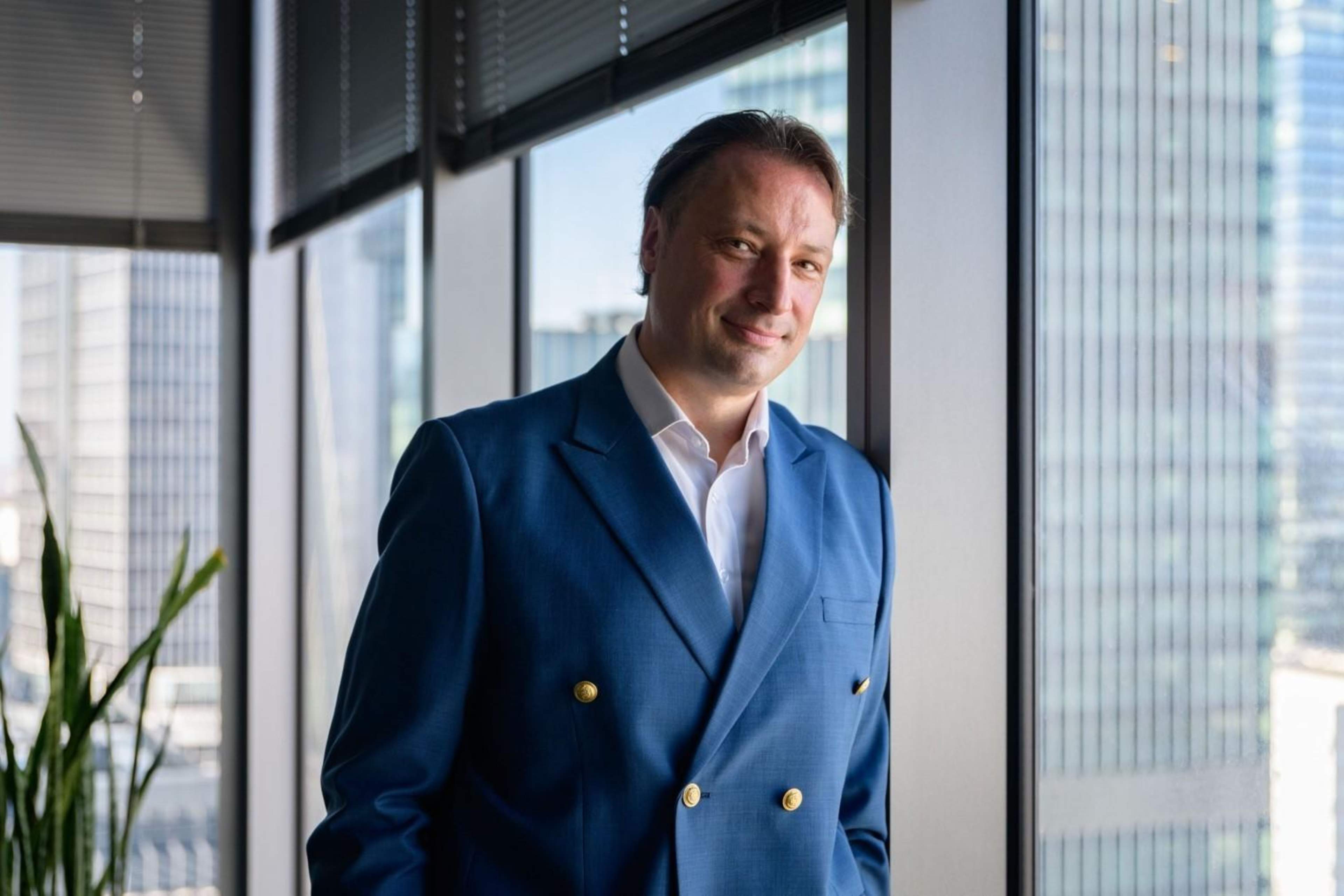 Adam Brożek EY Markets and Business Development Director, Leader of ...