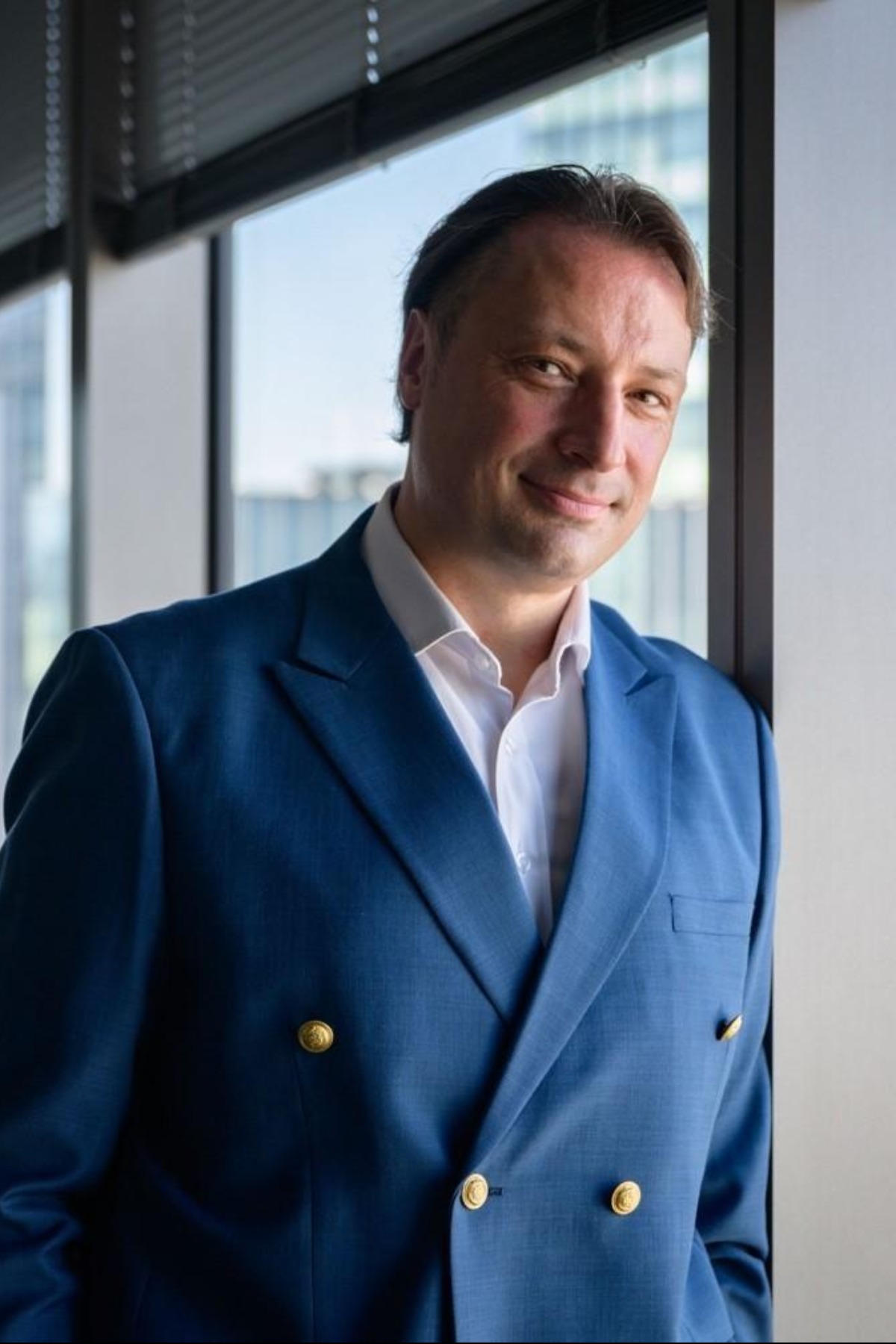 Adam Brożek EY Markets and Business Development Director, Lider zespołu ...